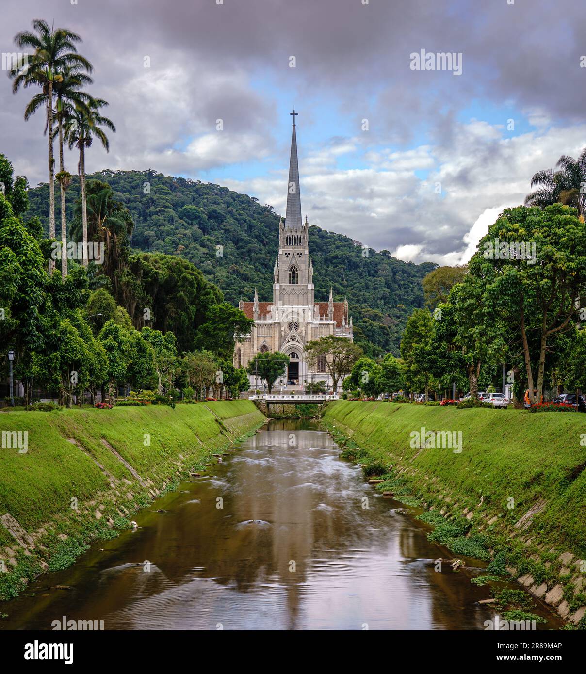 The Majestic Petropolis Cathedral amidst Palms and Water Stock Photo ...