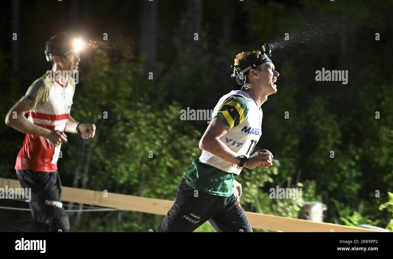 Athletes compete in the Jukola relay of the orienteering Jukola 2023 ...