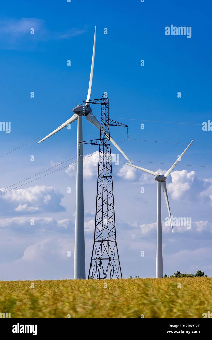 Electricity pylon wind turbines hi-res stock photography and images - Alamy