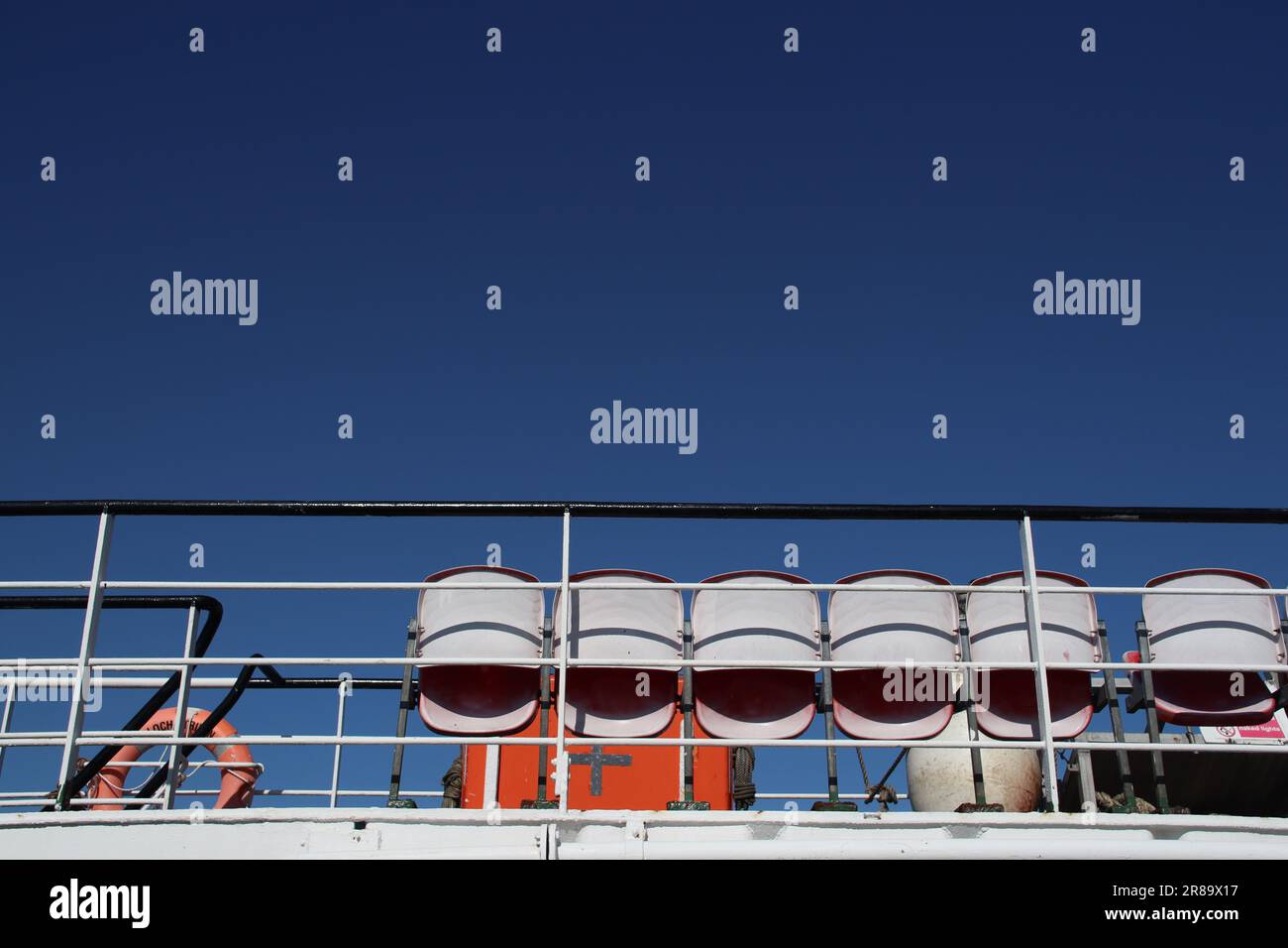 Seats and sky above Calmac ferry Stock Photo - Alamy