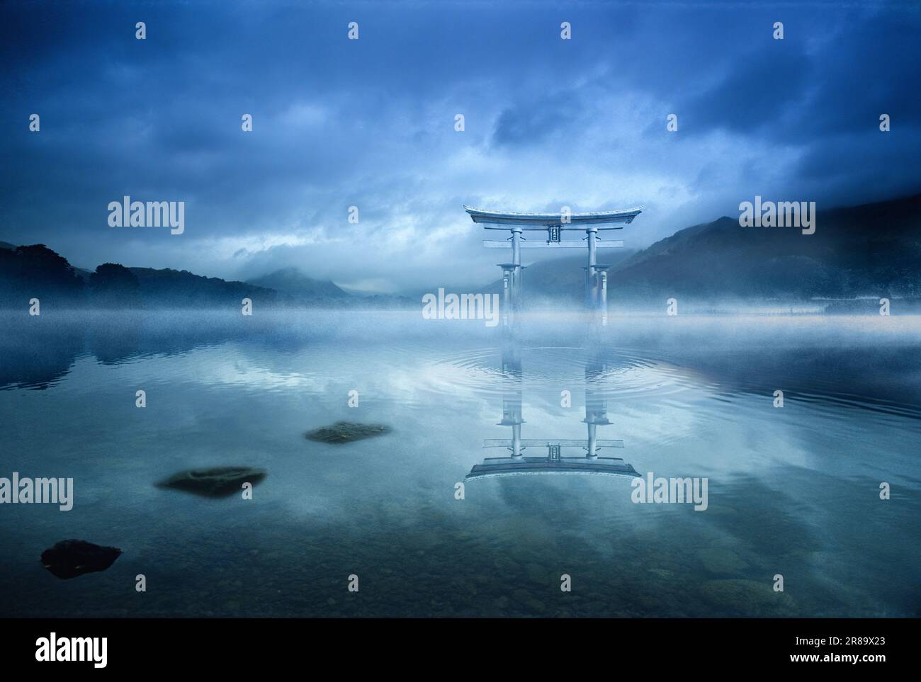 Floating Tori gate reflected in lake Stock Photo - Alamy