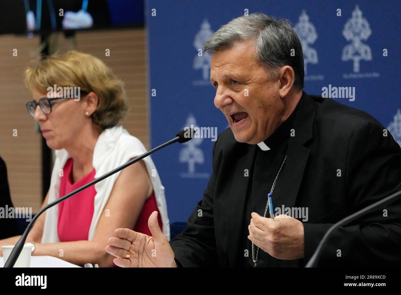 Secretary General of the Synod of Bishops Cardinal Mario Grech, right ...
