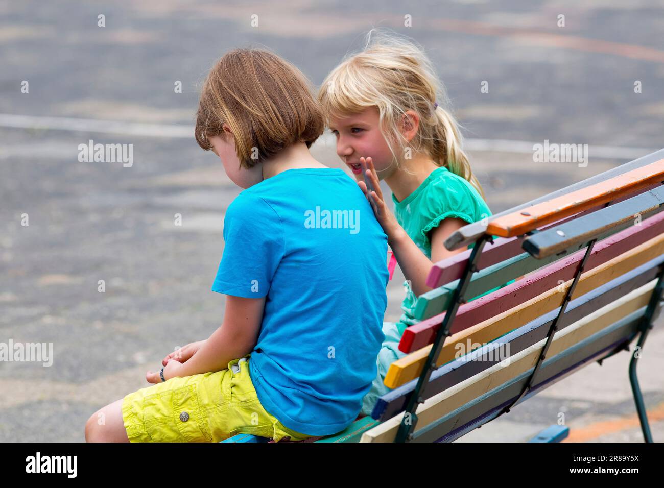 Child comforting another child hi-res stock photography and images - Alamy