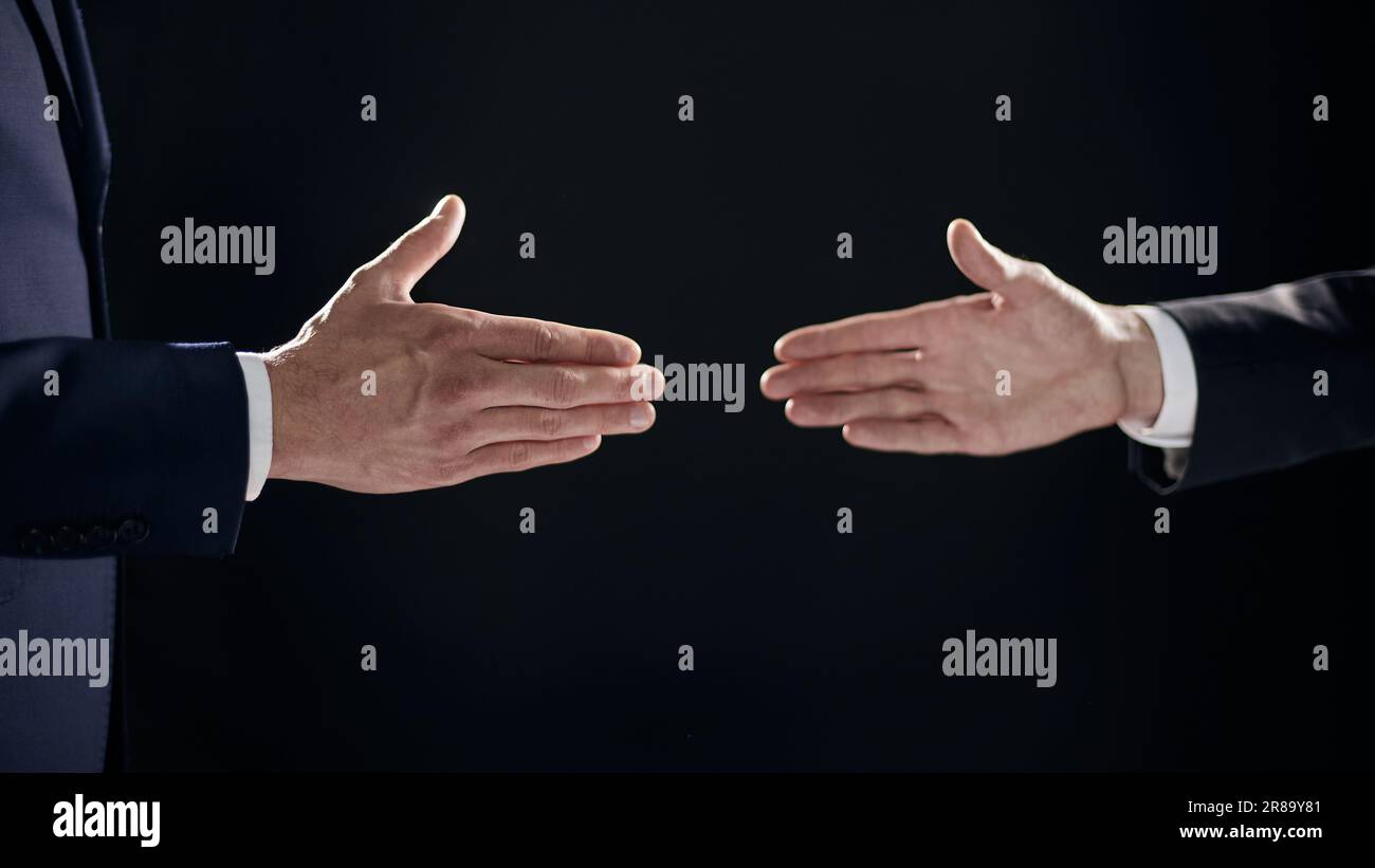 Close-up image of handshake between two colleagues Stock Photo - Alamy