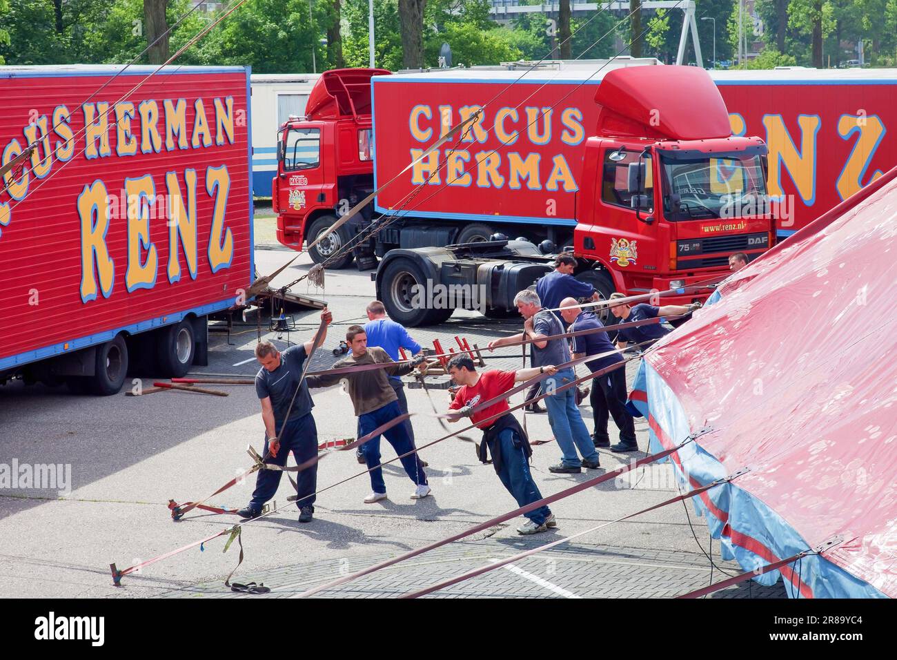 Netherlands, Arnhem. Raising or errecting the tent of circus Herman ...