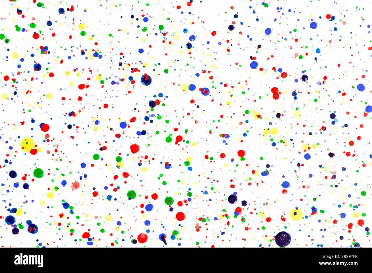 Colorful ink splashes. Paint splatters on bright material. Multi color ...