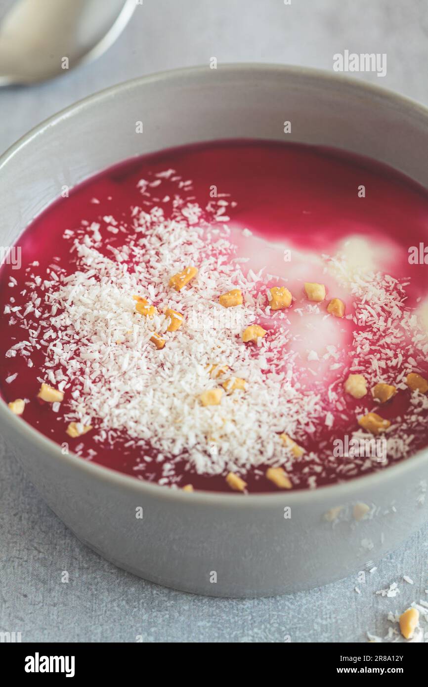 Malabi - traditional Arabic dessert. Milk pudding with rose syrup and ...