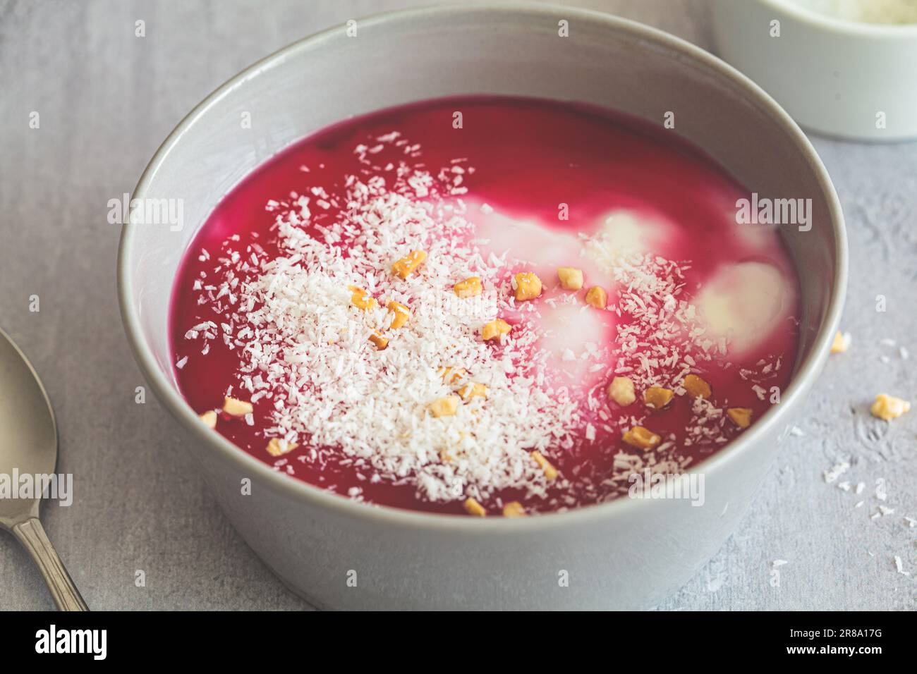 Malabi - traditional Arabic dessert. Milk pudding with rose syrup and ...