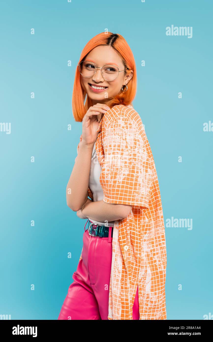 positive emotion, joyful and young asian woman with radiant smile ...