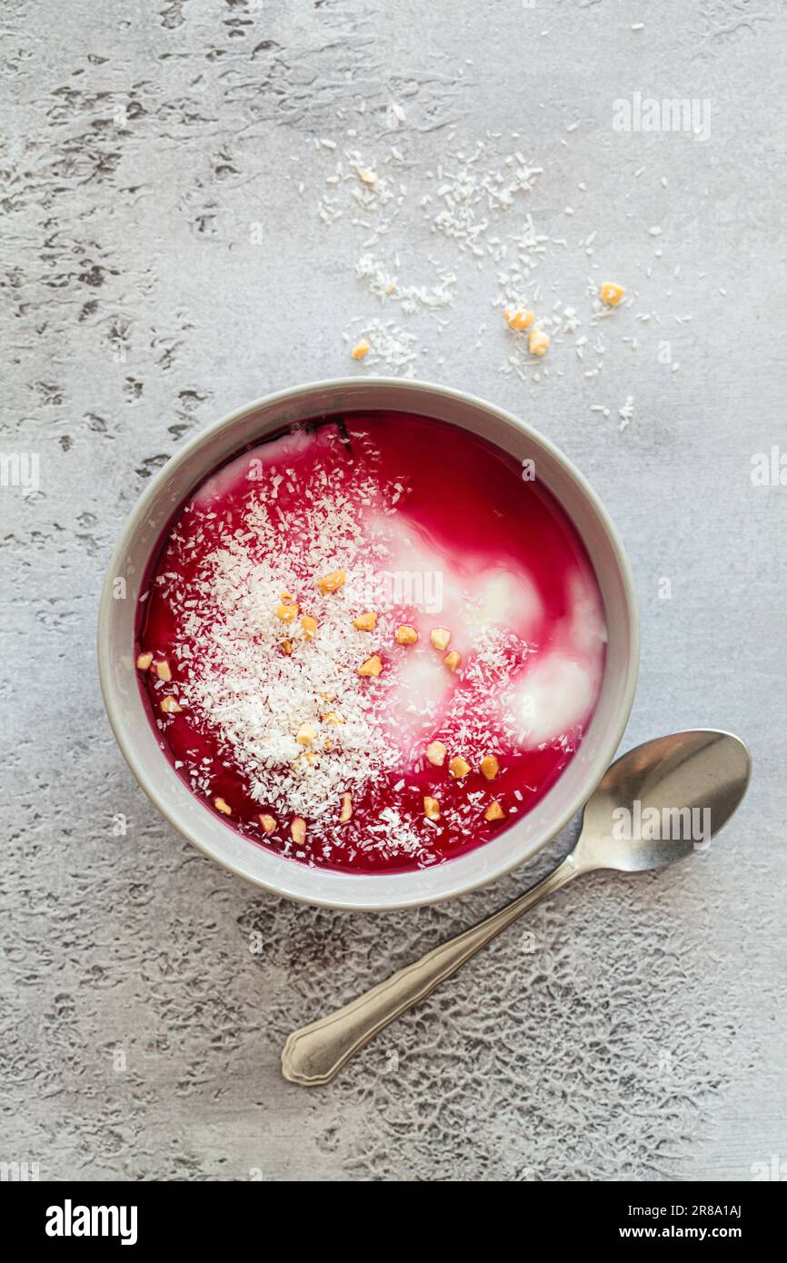 Malabi - traditional Arabic dessert. Milk pudding with rose syrup and ...