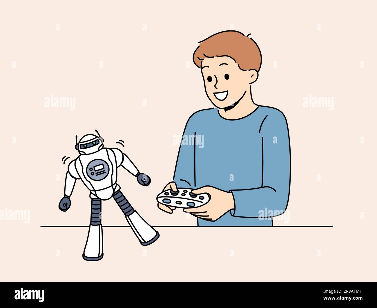 Boy with toy remote controlled robot for concept of learning robotics ...