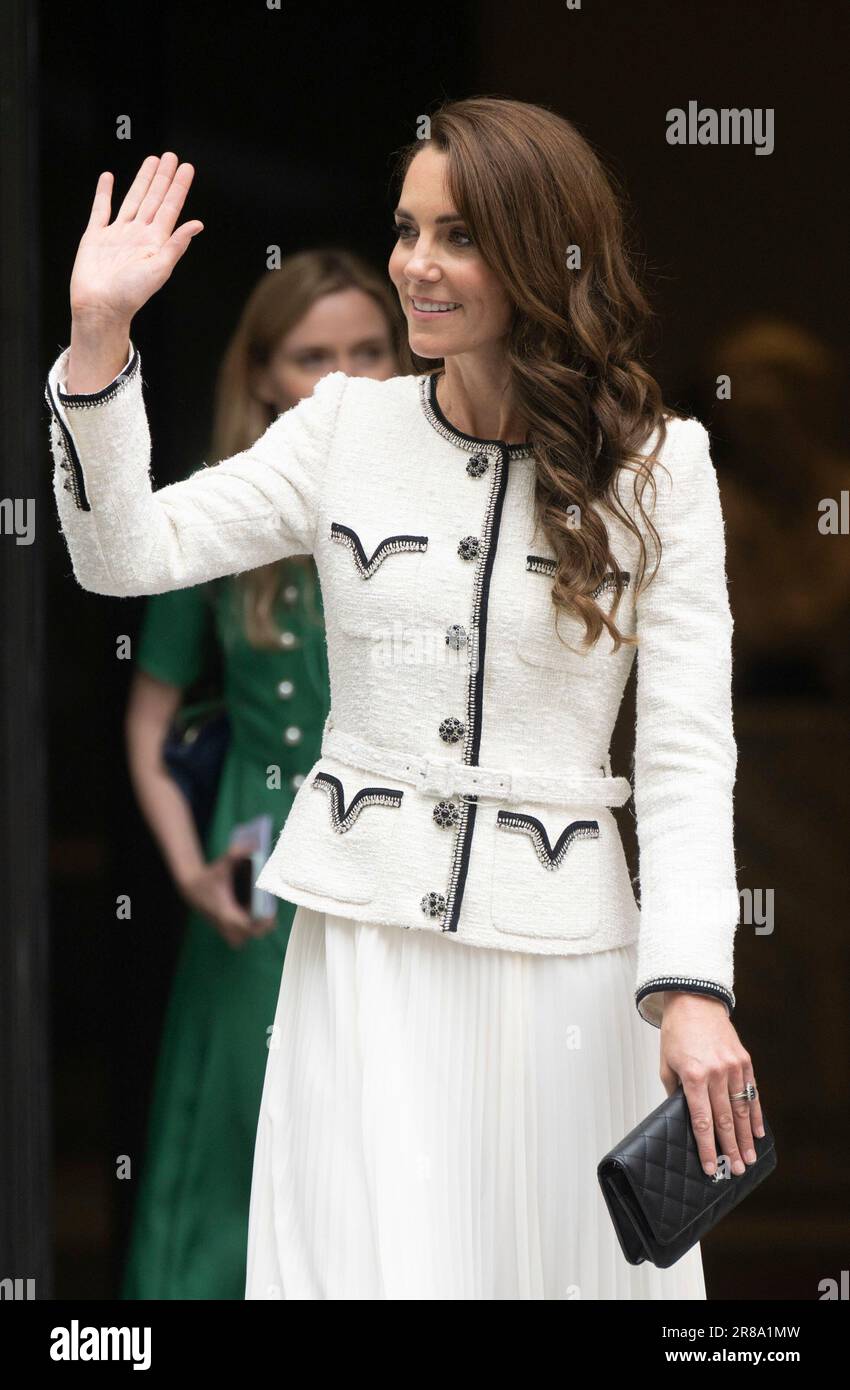 Britain's Kate, Princess of Wales, waves after a visit to re-open the ...
