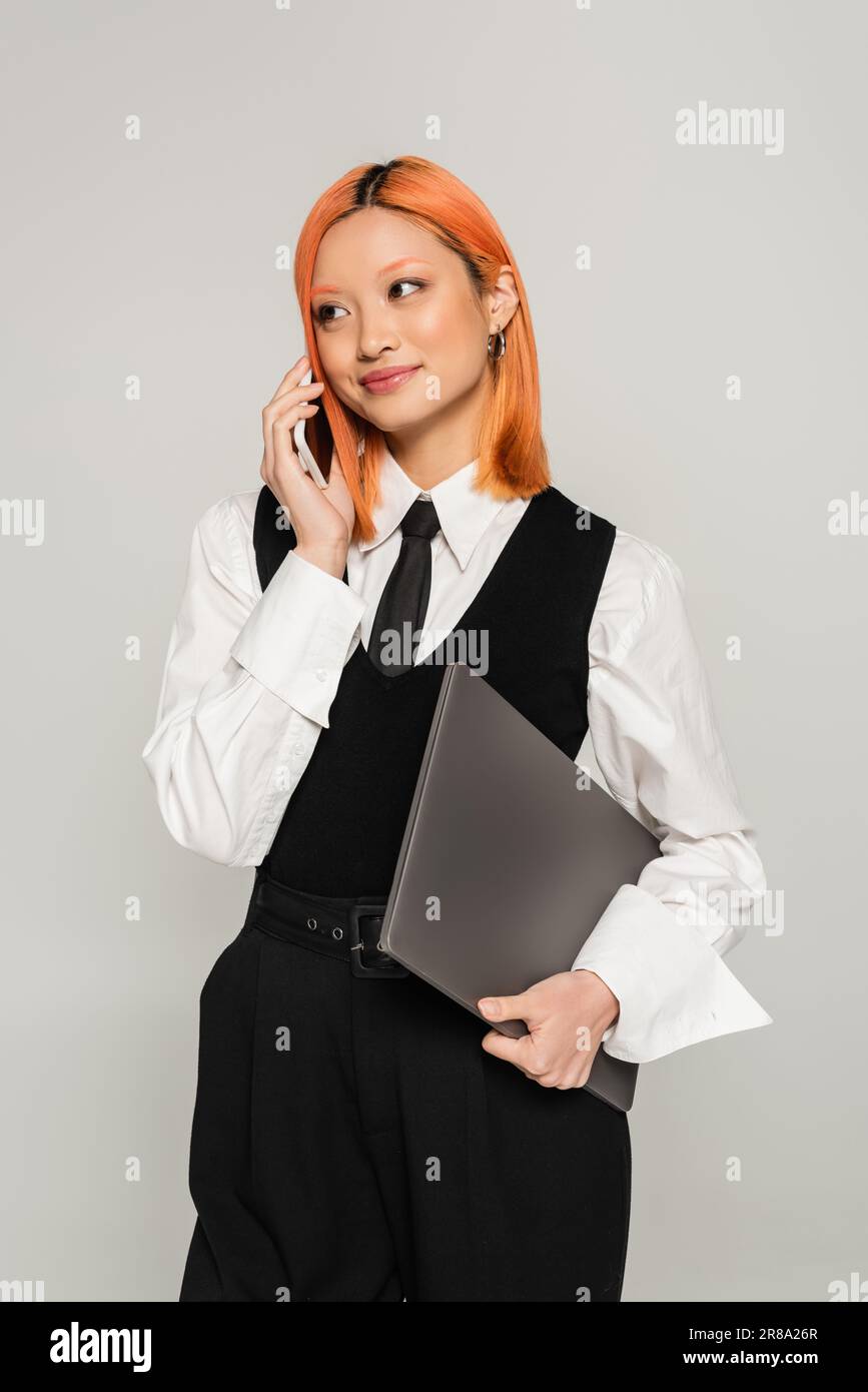 happy emotion, phone call, young asian woman holding laptop and smiling ...