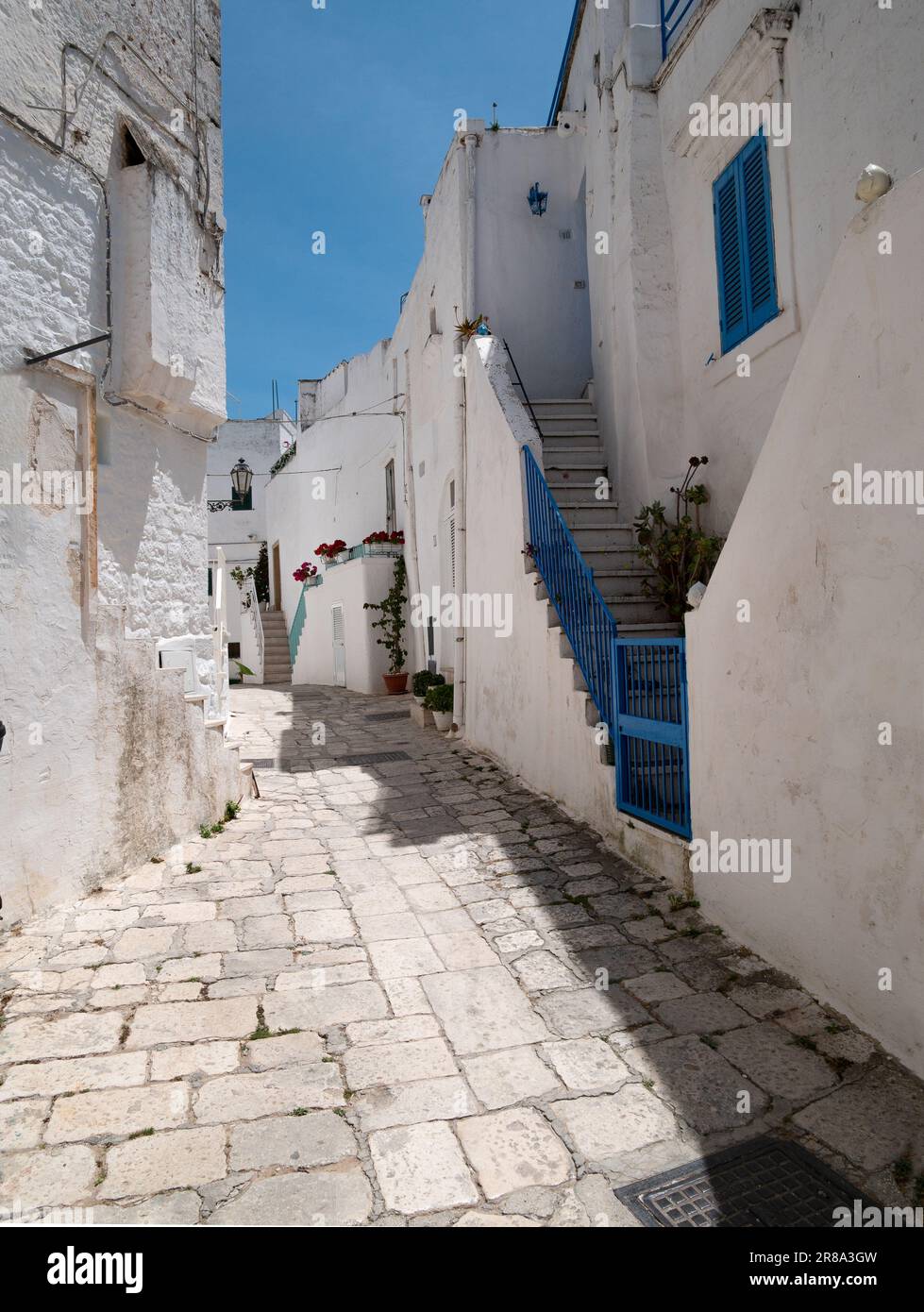Ostuni ,Italy - 09 June 2023:view of some alleys of the ancient city of ...