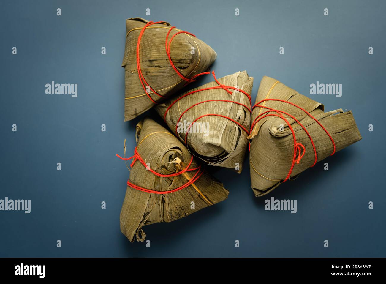 Wrapping zongzi hi-res stock photography and images - Alamy