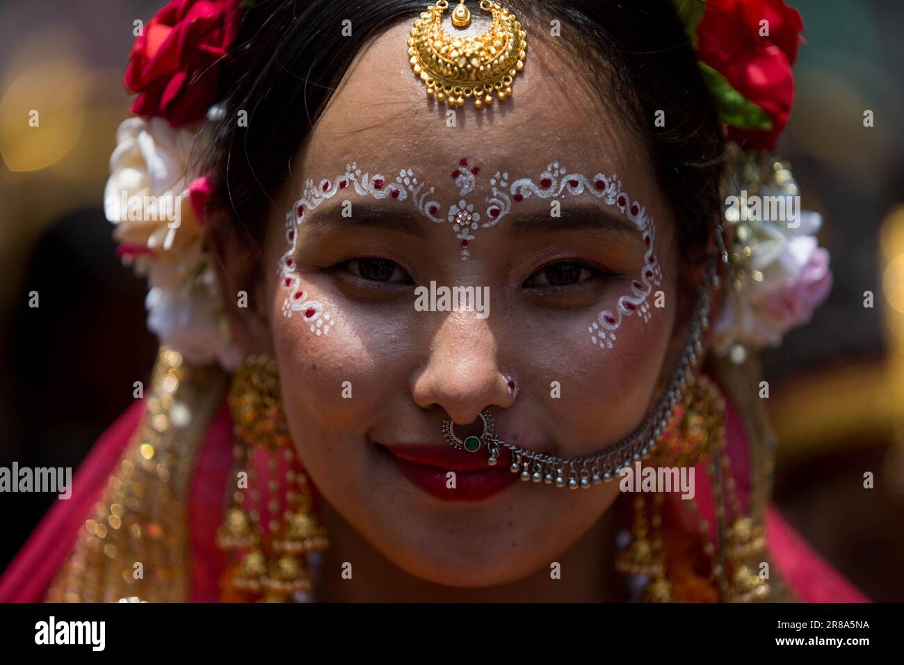 Kathmandu, Nepal. 20th June, 2023. A woman in traditional attire is ...