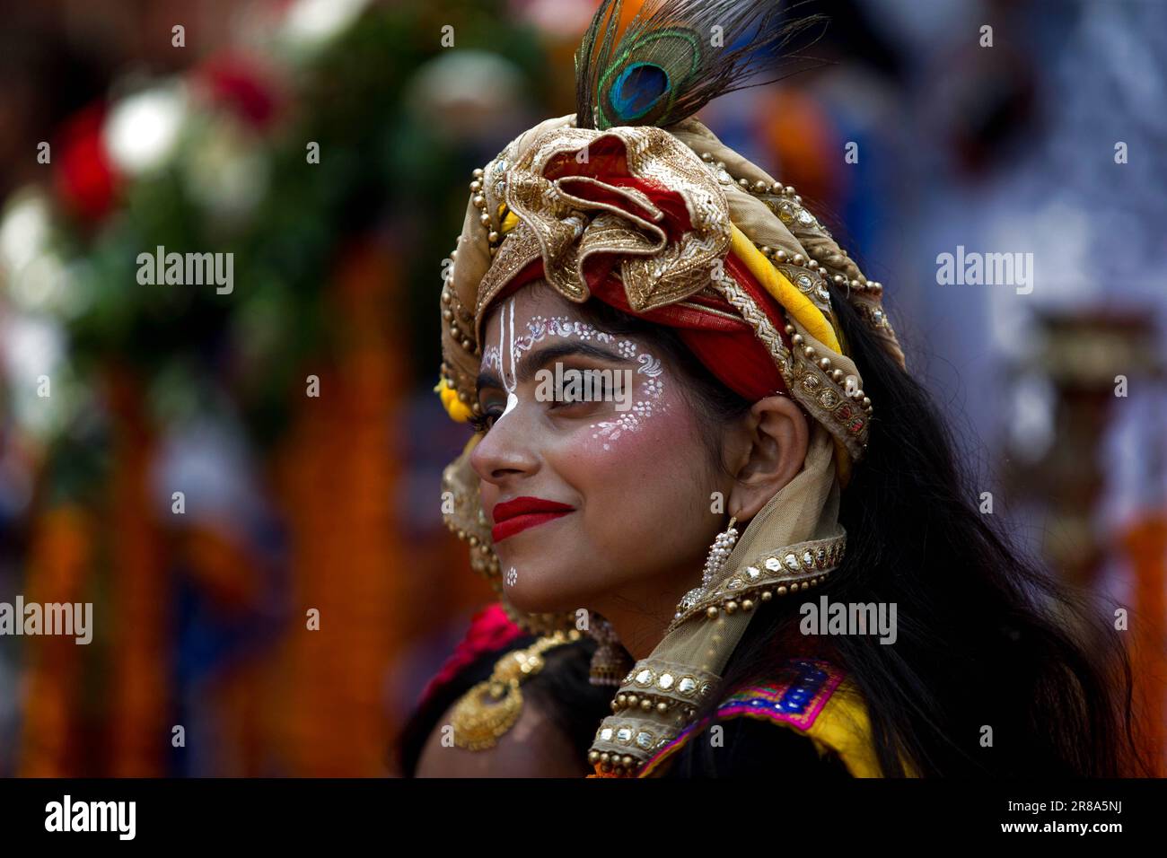Kathmandu, Nepal. 20th June, 2023. A woman in traditional attire is ...