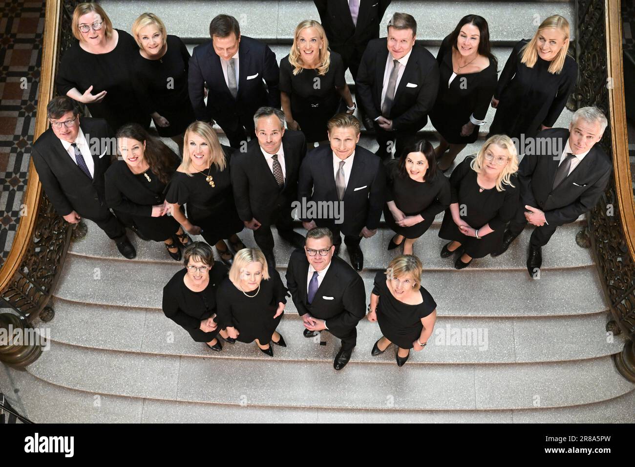 The new Government of Finland led by Prime Minister Petteri Orpo pose for a family picture in ...