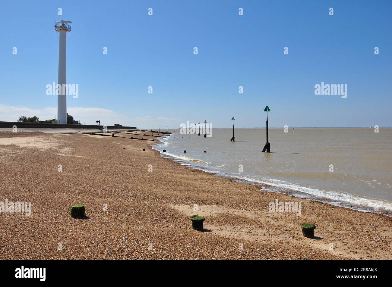 The shingle beach, radar tower and groyne markers at Languard Point ...