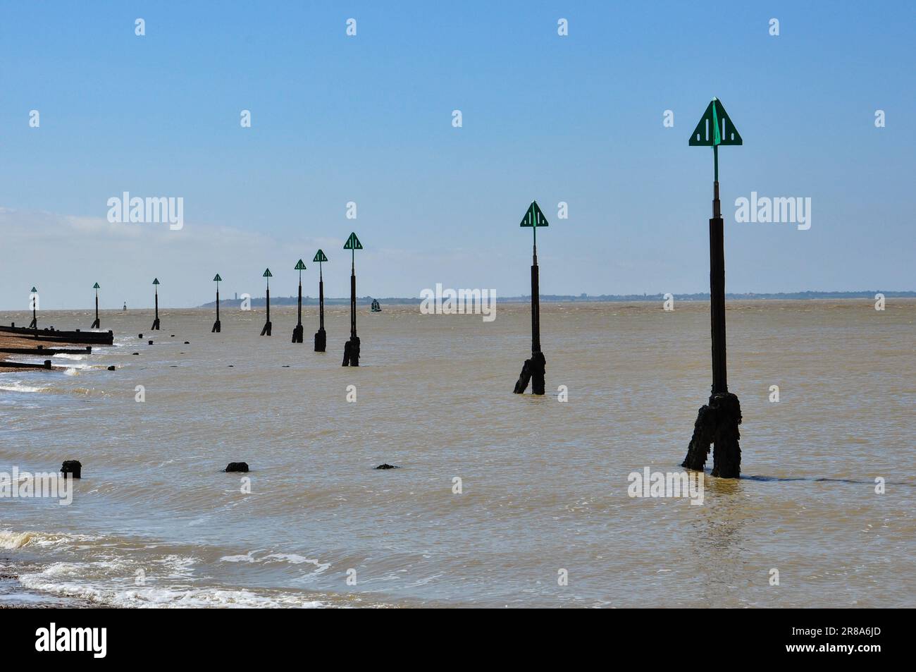 Marking posts at the end of beach groynes at Languard Point, Felixstowe ...