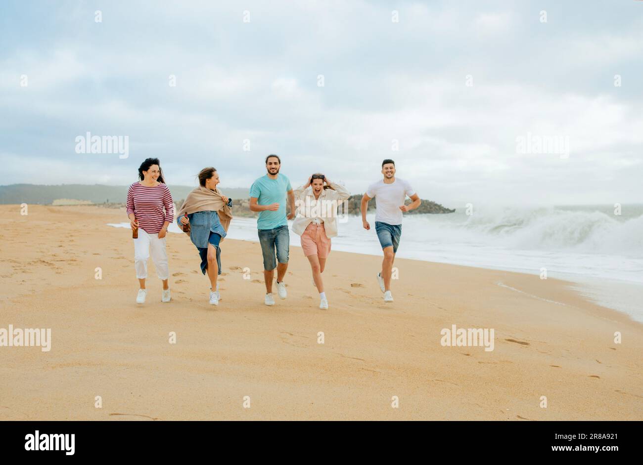 Glad excited millennial european and arab people student run, enjoy ...