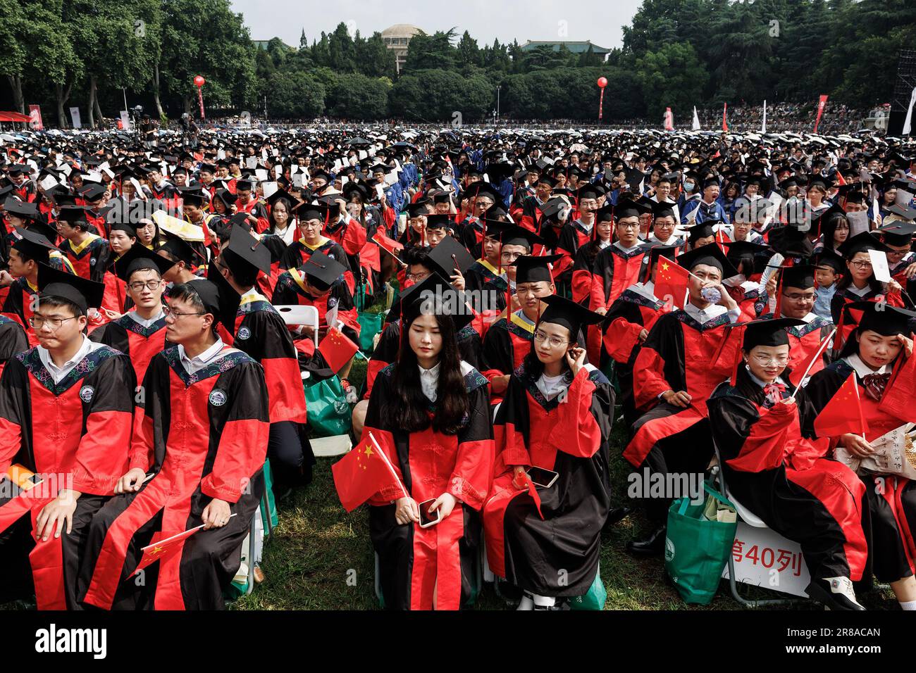University graduates attend graduation ceremony hi-res stock ...