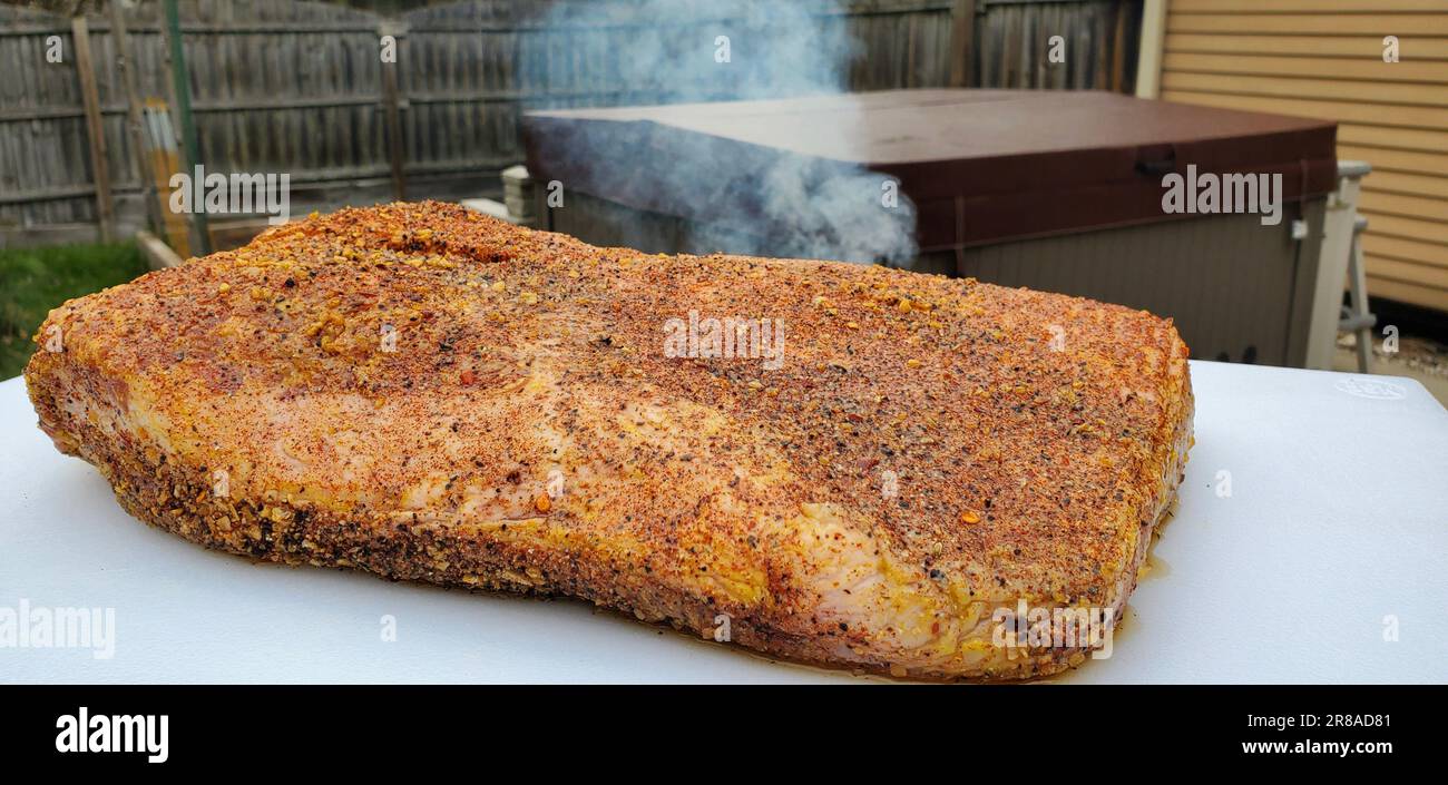 Seasoned beef brisket ready for the smoker Stock Photo - Alamy