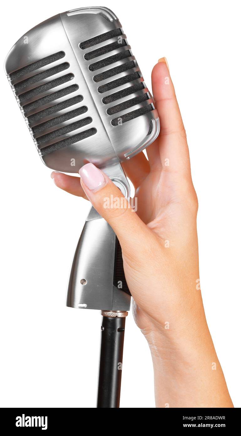 woman holding big retro microphone for singing Stock Photo - Alamy