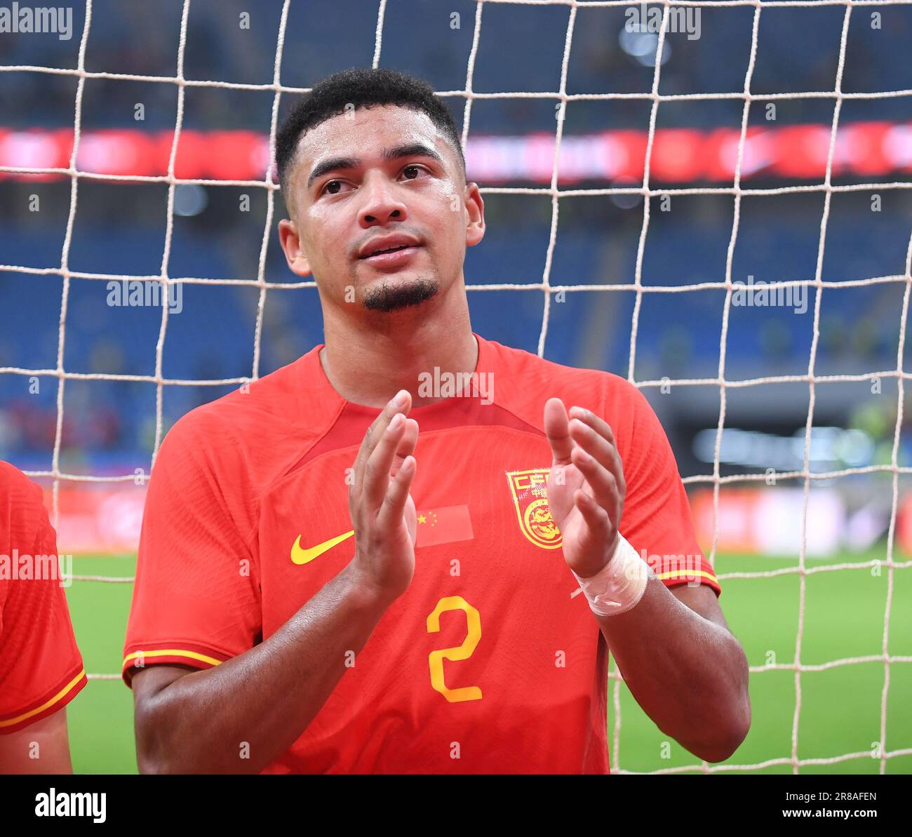 Dalian, China's Liaoning Province. 20th June, 2023. Jiang Guangtai of China greets spectators ...