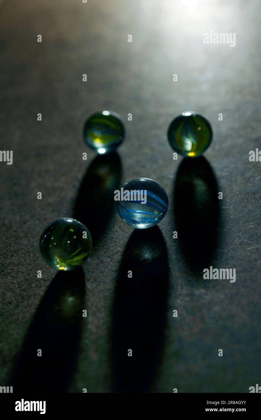 Four marbles hi-res stock photography and images - Alamy