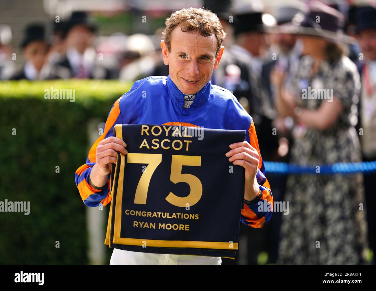 Jockey Ryan Moore poses for a photo after winning The King's Stand Stakes on Paddington during ...
