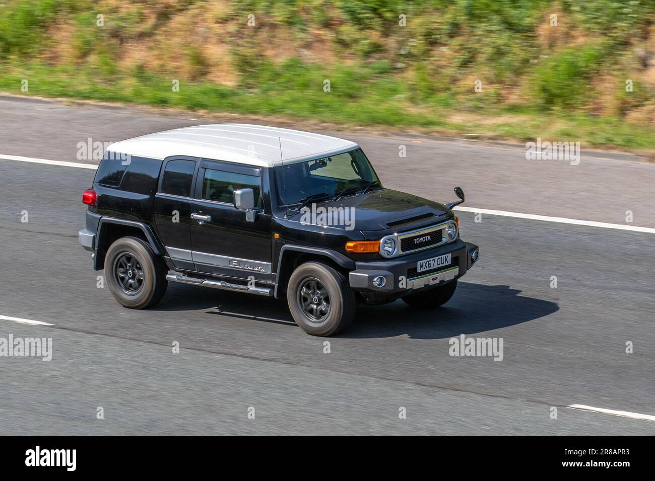 2017 Grey Nissan X-Trail N-Connecta Dig-T, compact crossover SUV travelling on the M6 motorway ...
