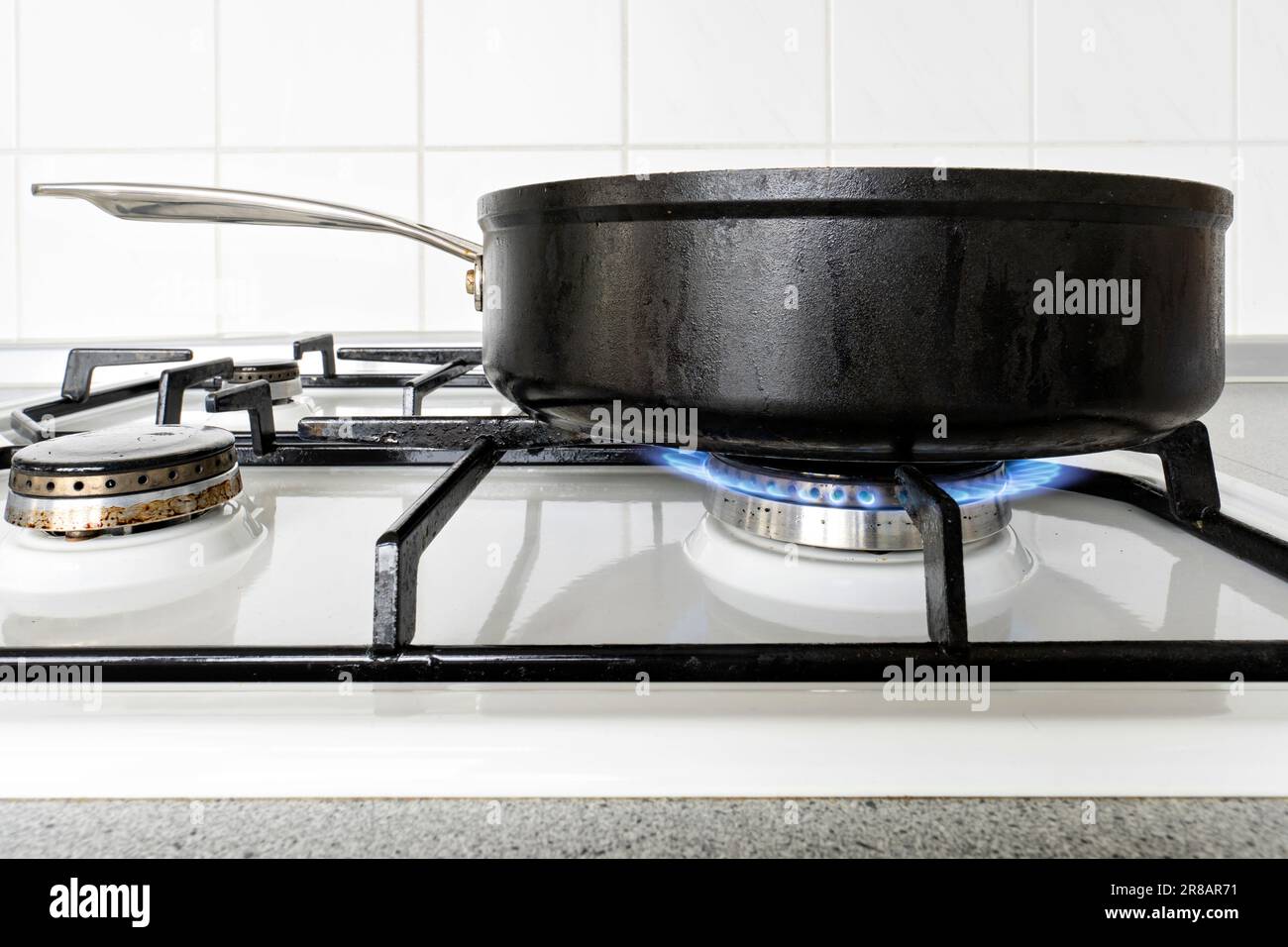 Flame on gas stove pan hi-res stock photography and images - Alamy