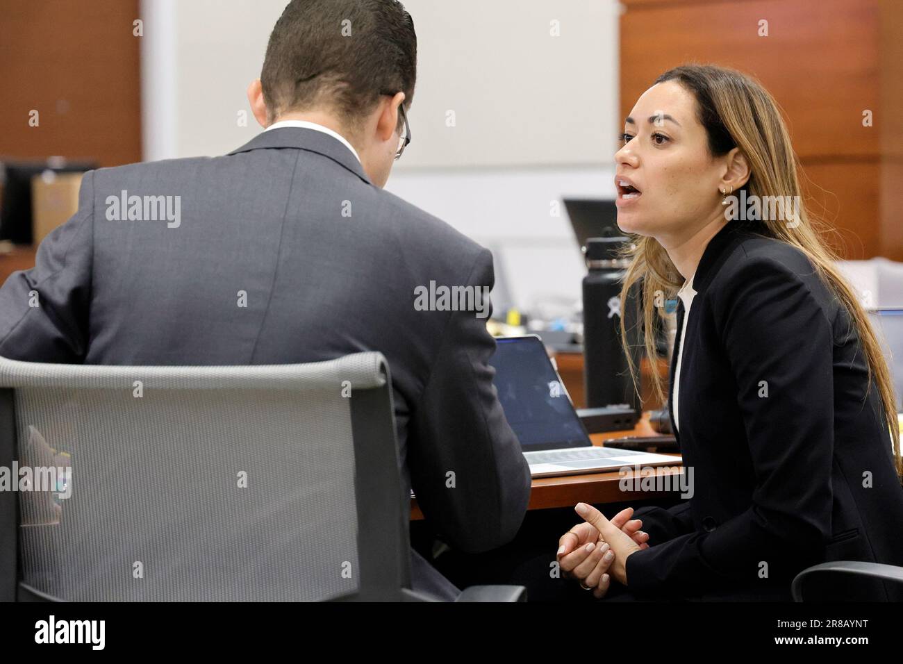 Legal assistant Aaron Savitski and Assistant State Attorney Kristen ...