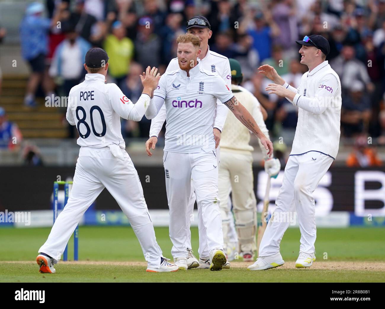 England captain Ben Stokes (centre) celebrates with team-mates after ...
