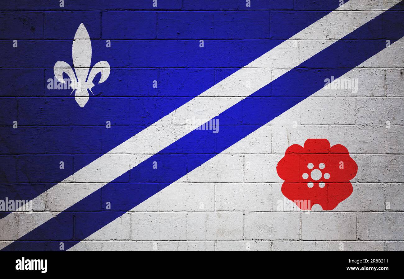 Flag of the Franco-Albertans painted on a cinder block wall Stock Photo ...