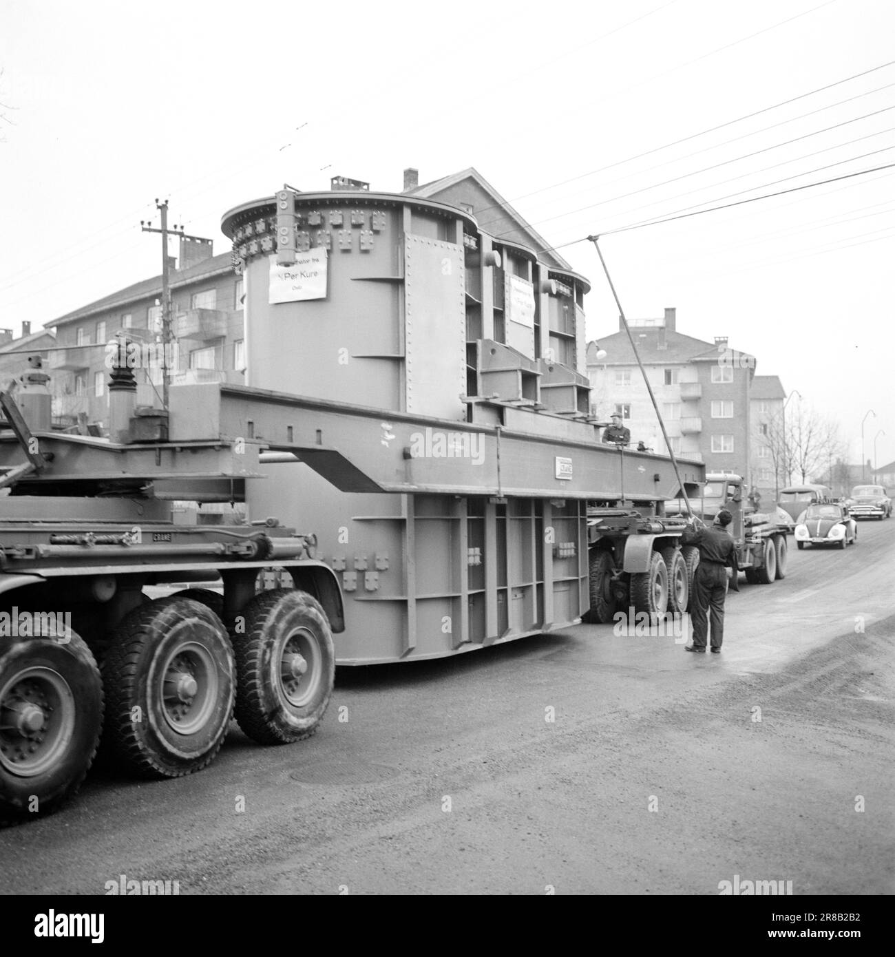 Current 57-3-1960: Giant on city tour Forty wheels rolled in unison ...
