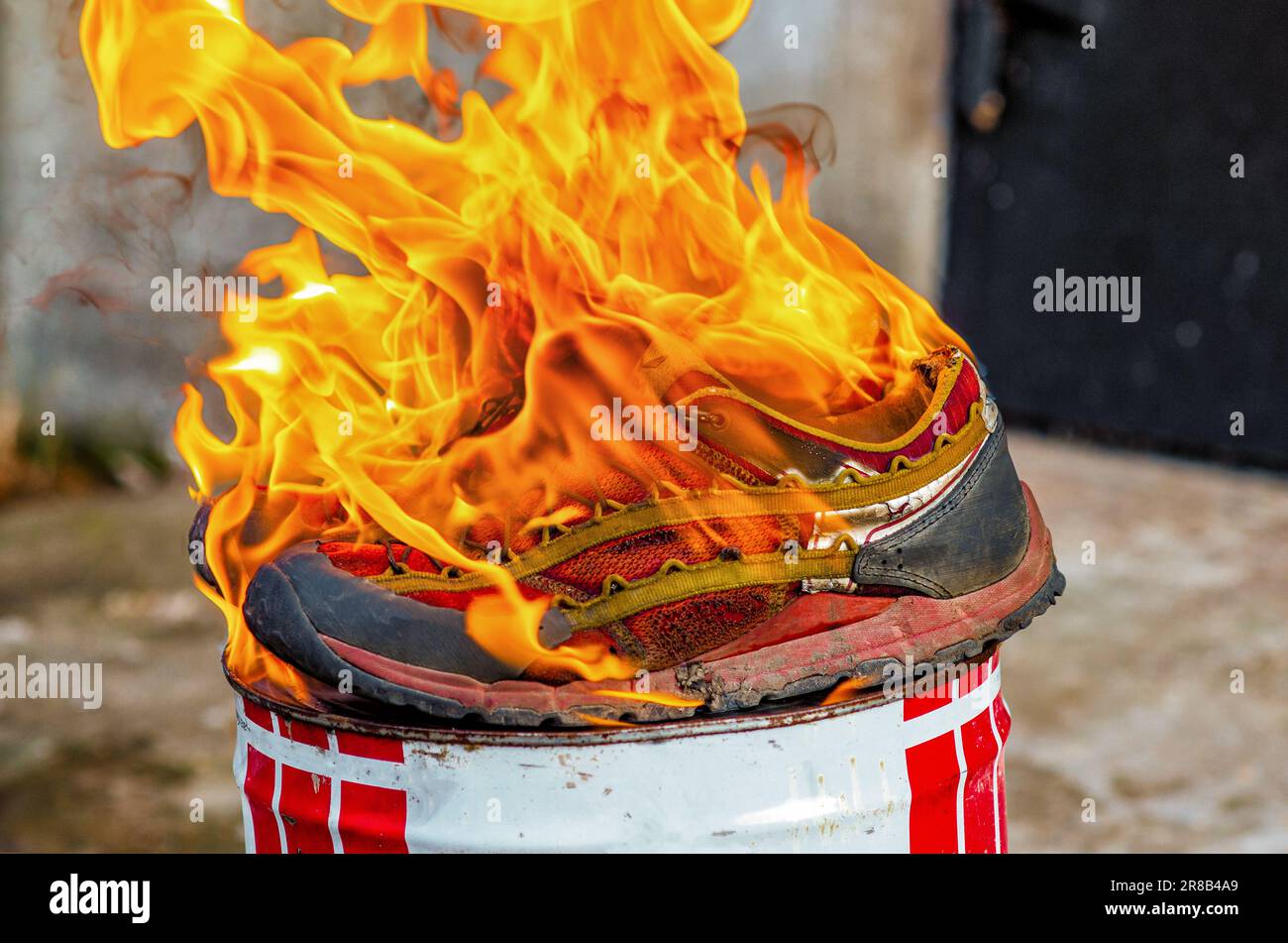 Burning shoes hi-res stock photography and images - Alamy
