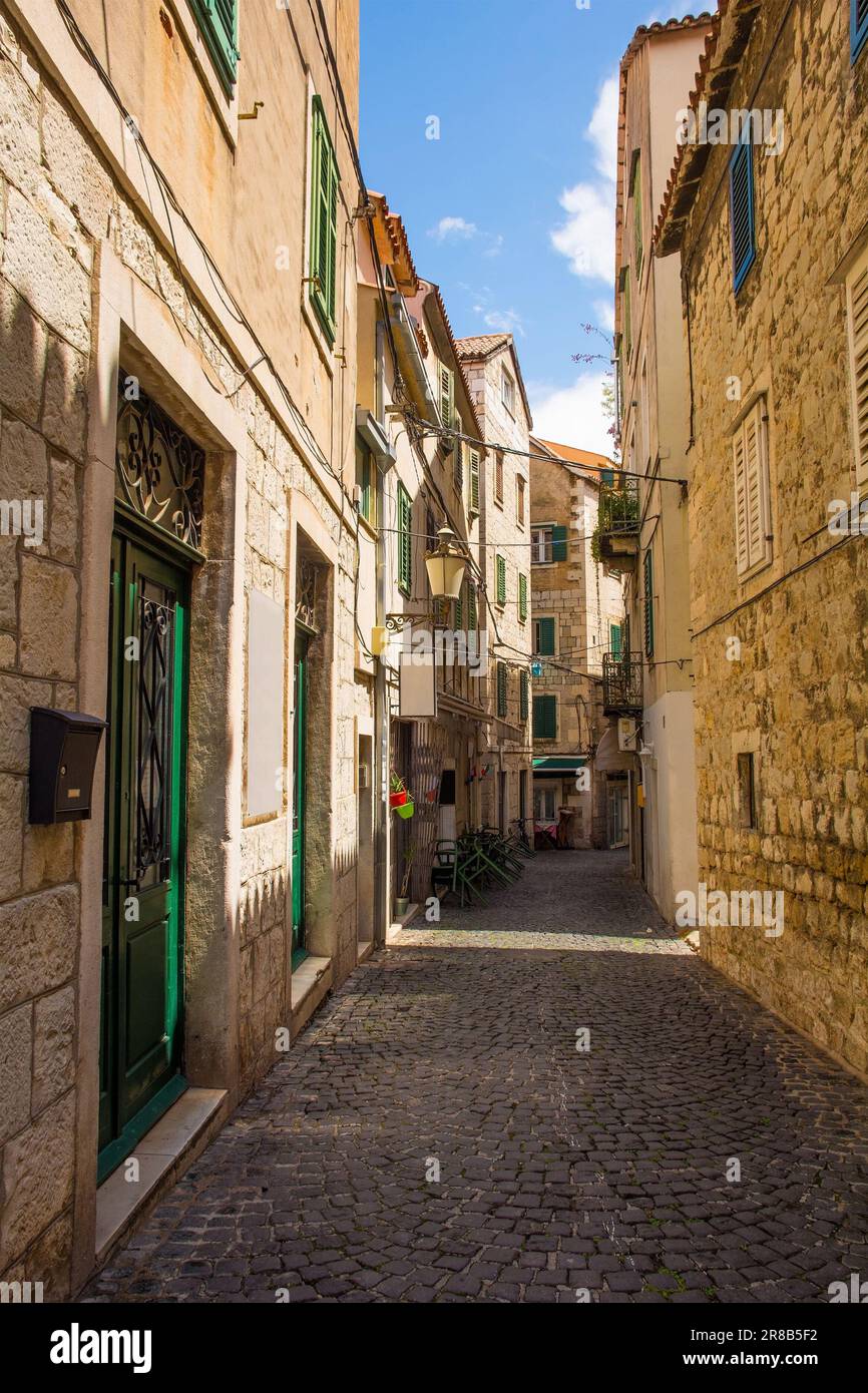 Historic residential buildings in a quiet back street in the city of ...