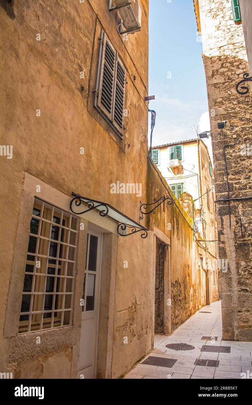 Historic residential buildings in a quiet back street in the city of ...