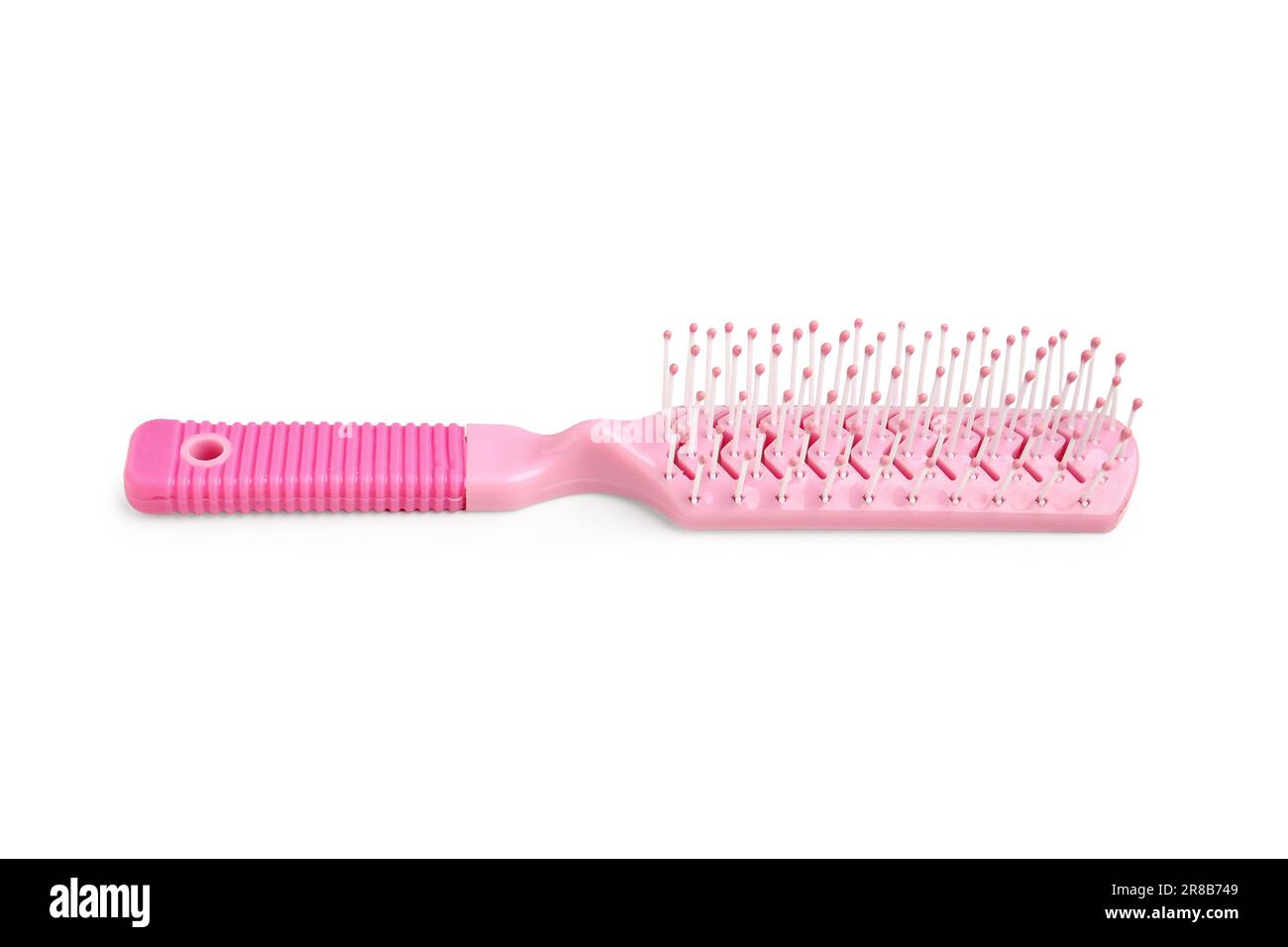 Pink hair brush on white background Stock Photo - Alamy