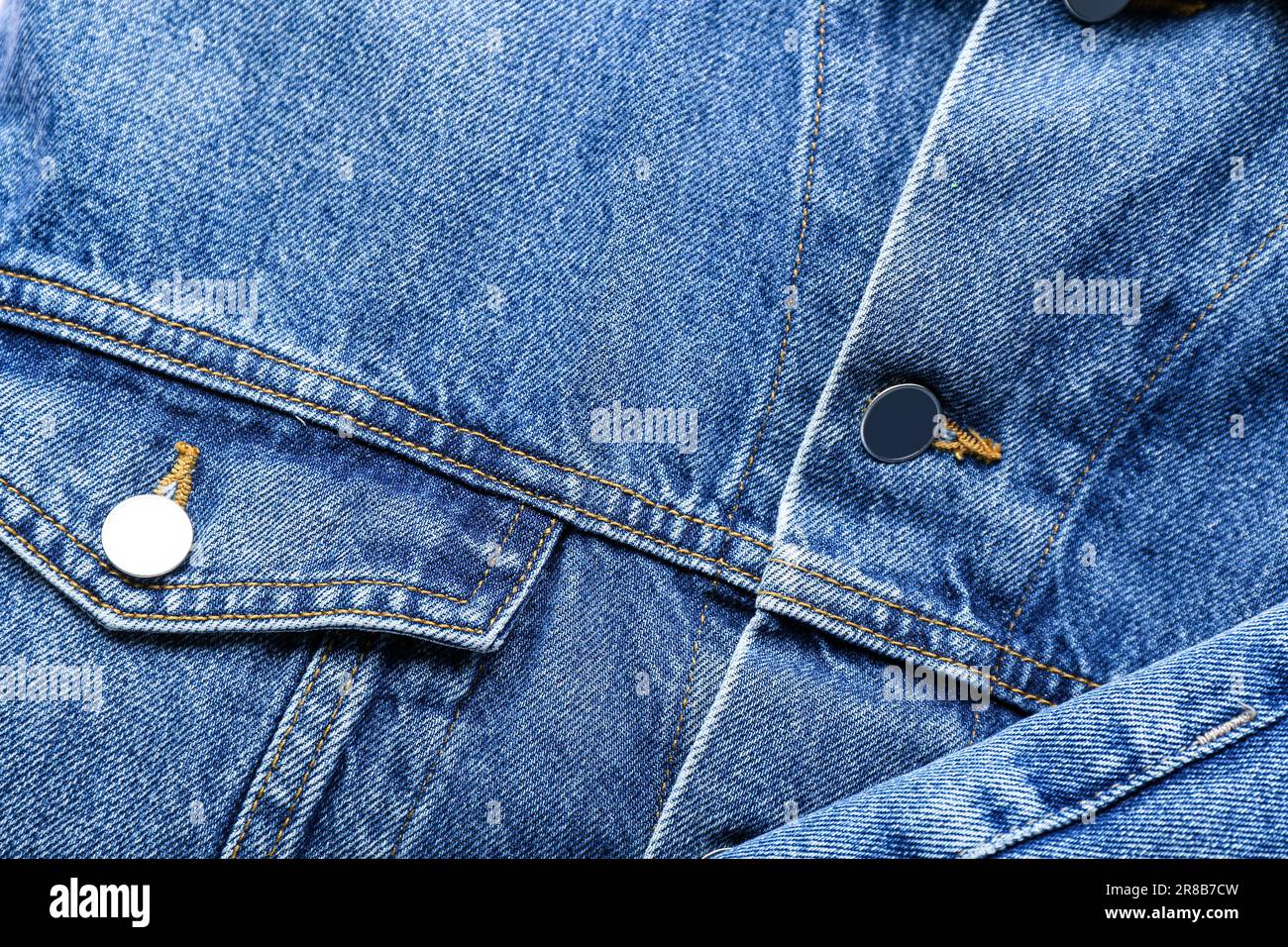 Denim jacket as background, closeup Stock Photo - Alamy