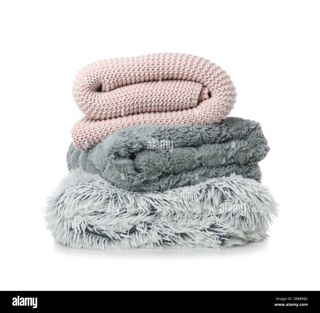 New soft folded blankets on white background Stock Photo - Alamy