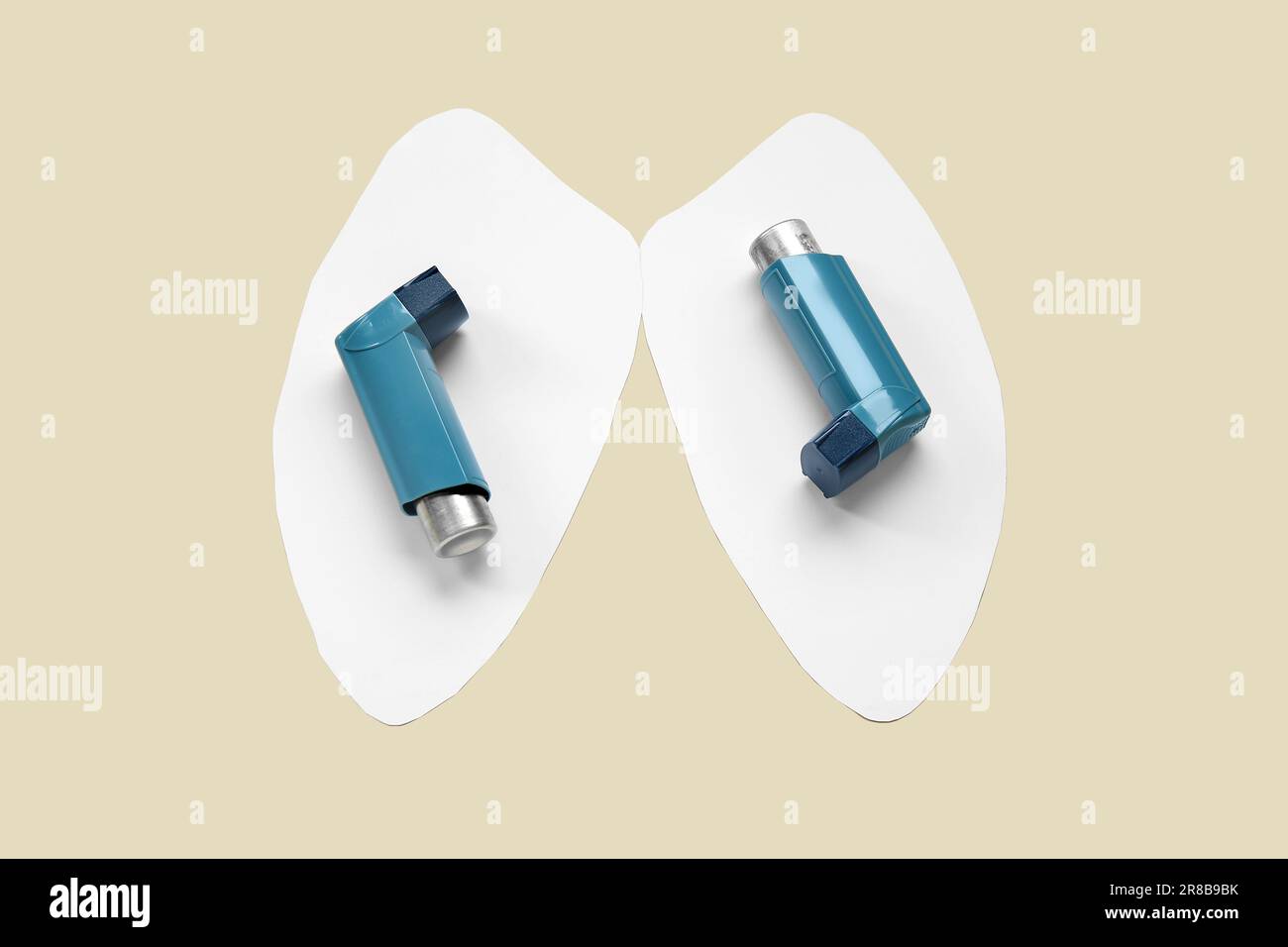 Paper lungs and asthma inhalers on beige background Stock Photo - Alamy