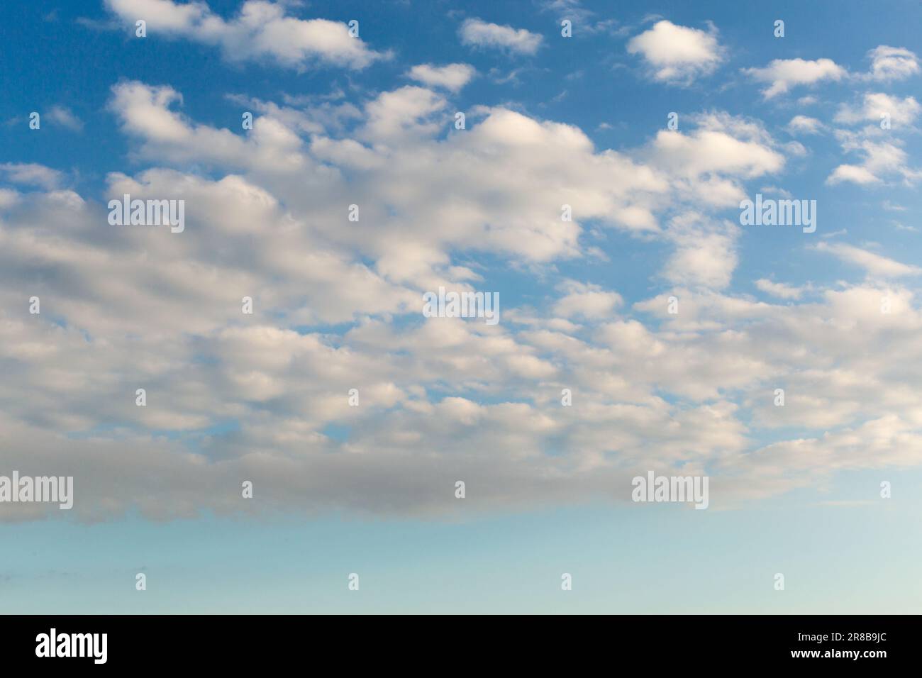 Clouds and blue sky background Stock Photo - Alamy