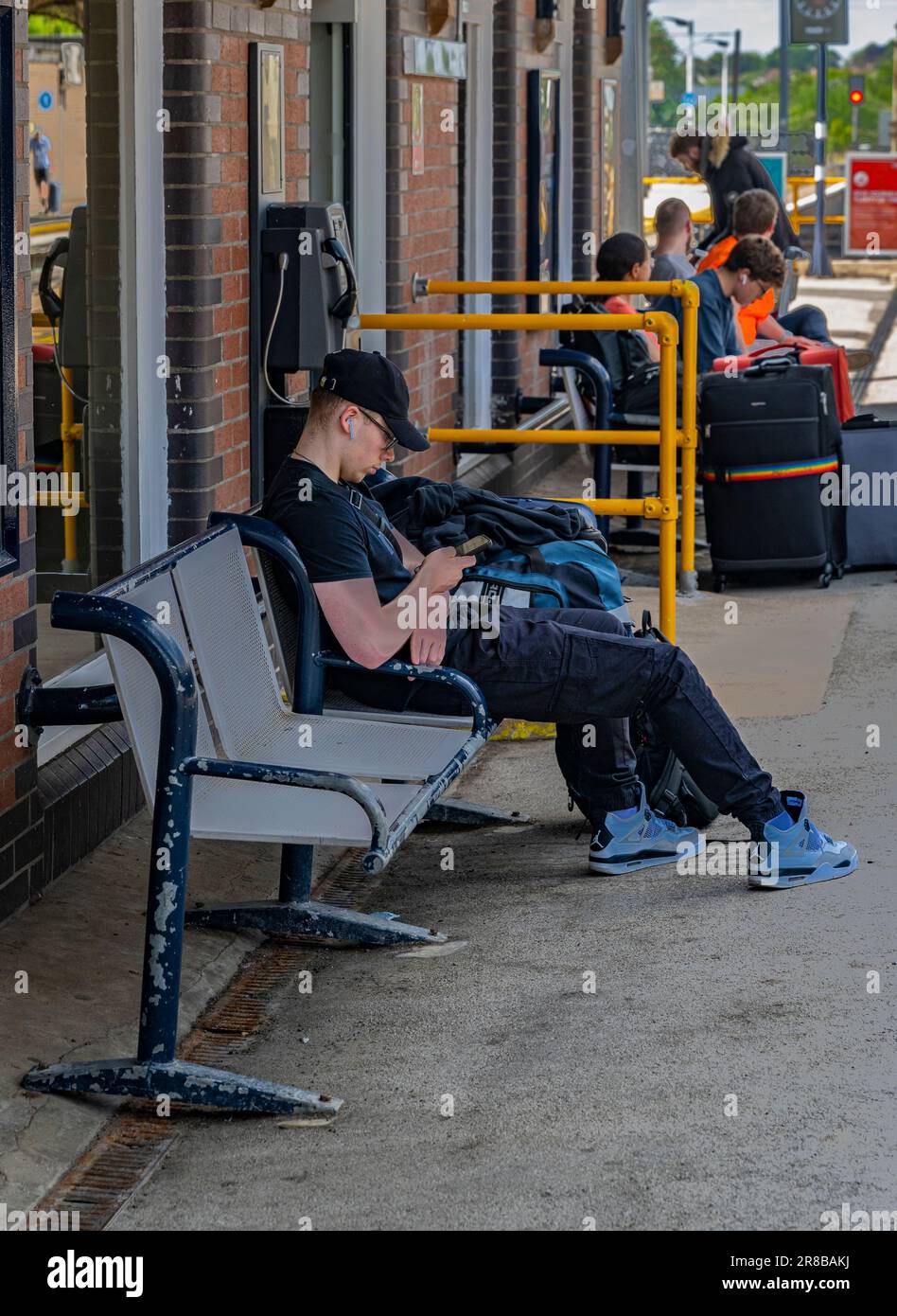 Grantham Train Station – Passengers and travellers waiting on the platform for the arrival of ...