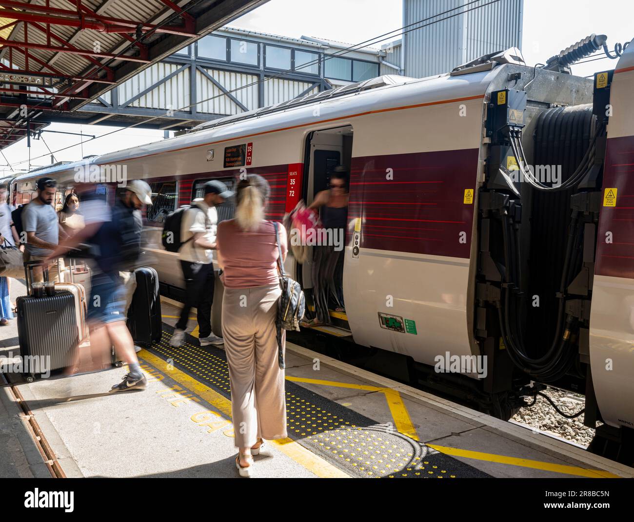 Grantham Train Station – Passengers boarding a London North Eastern Railway (LNER) Azuma Train ...