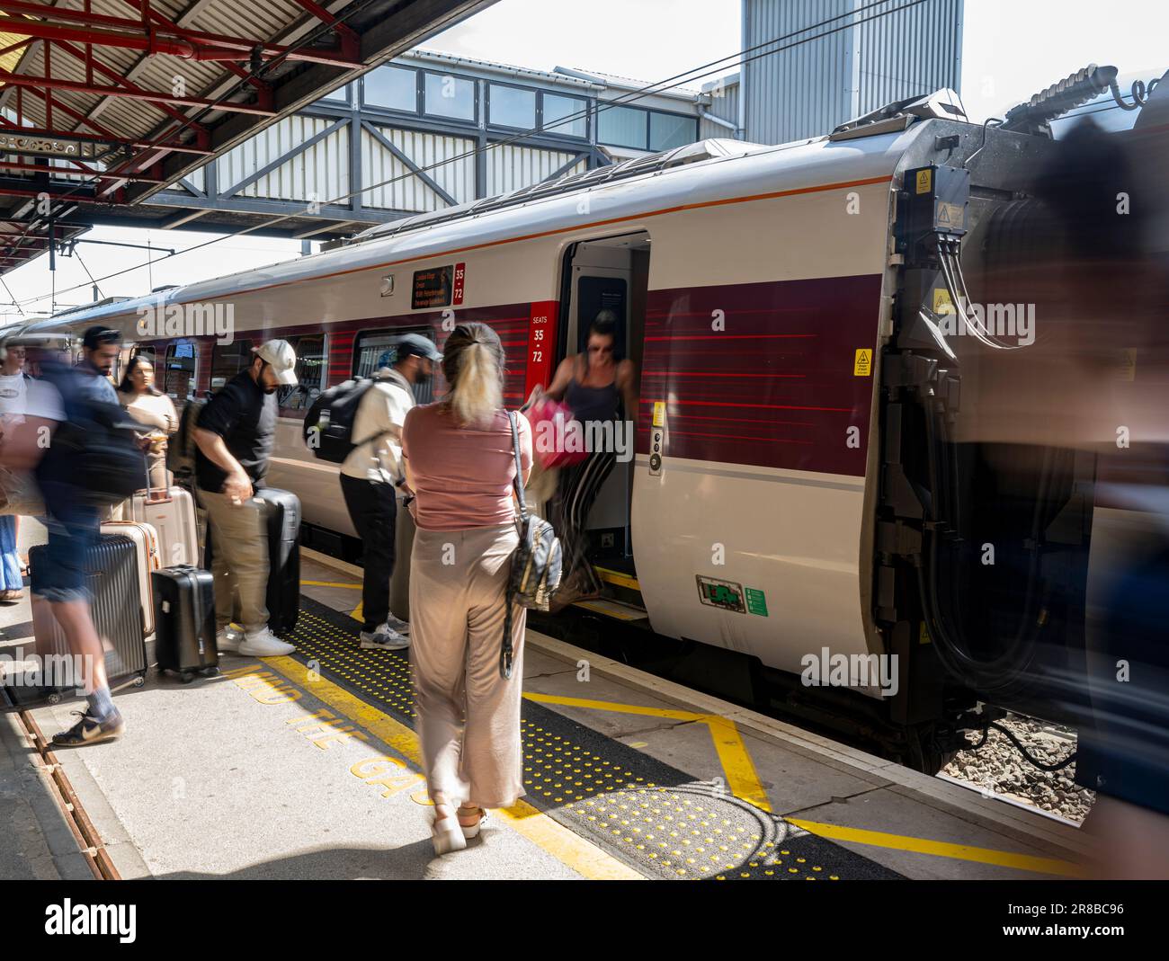 Grantham Train Station – Passengers boarding a London North Eastern Railway (LNER) Azuma Train ...