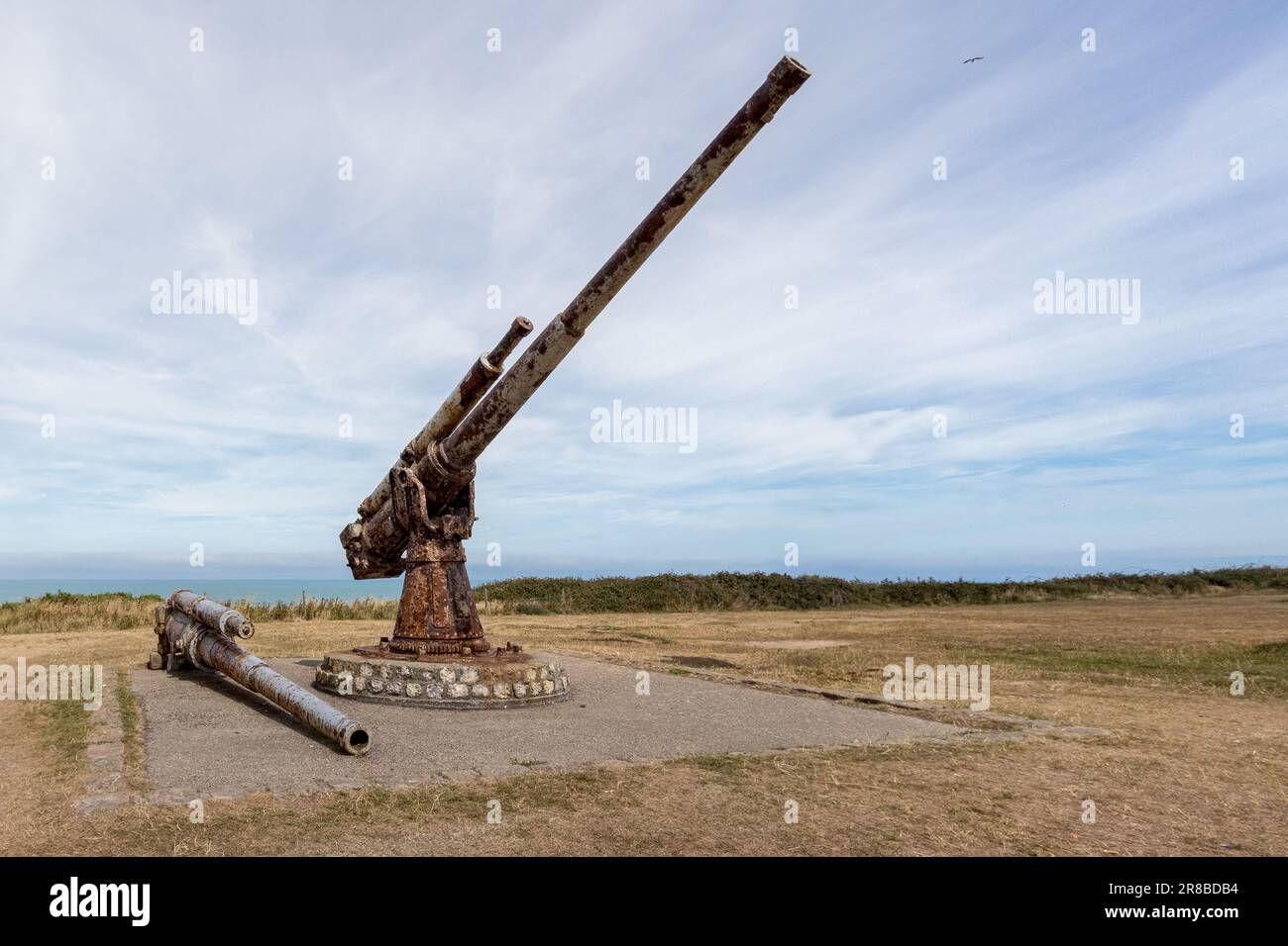 Old German gun on the Atlantic coast of Normandy Stock Photo - Alamy