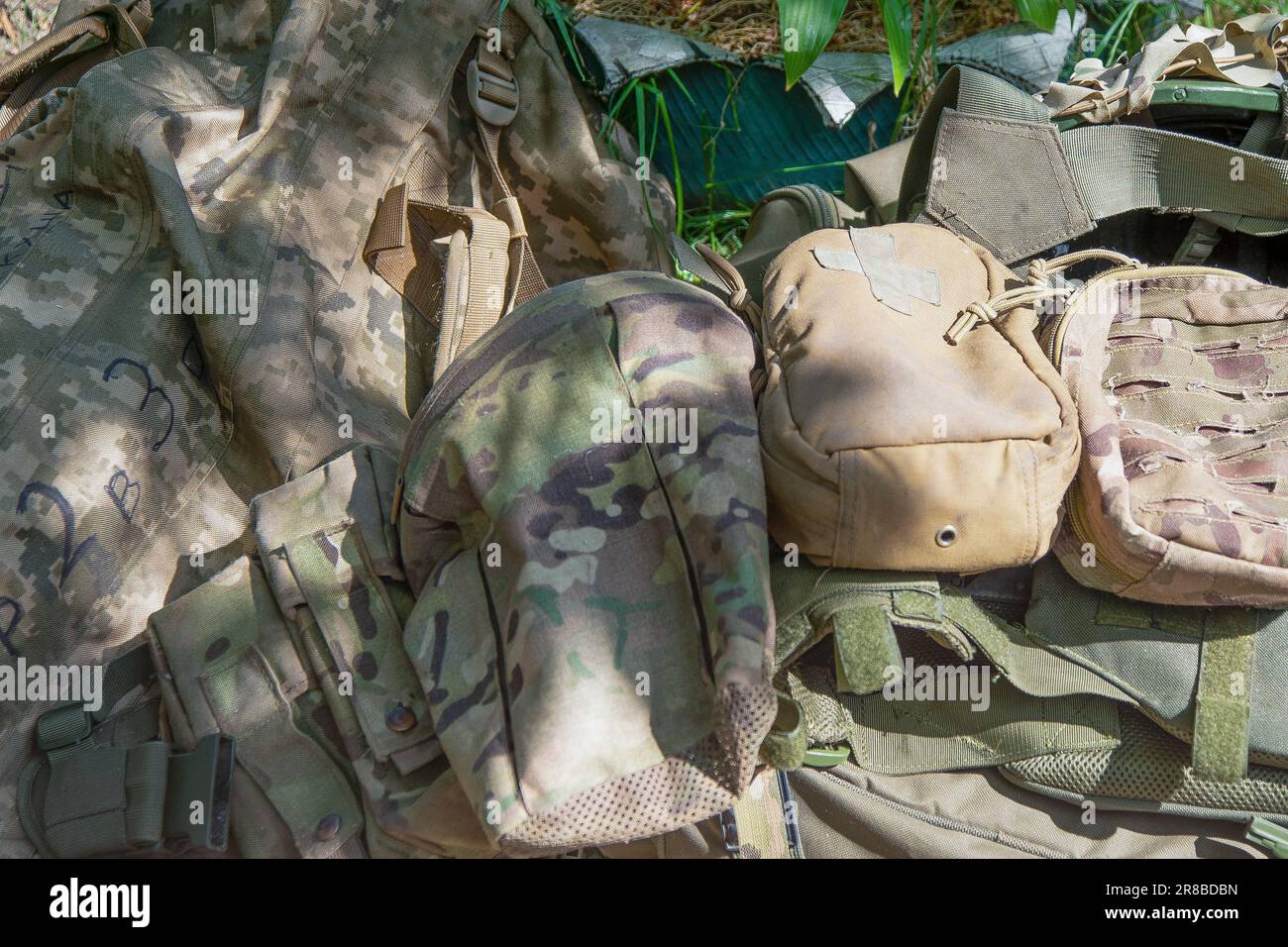Bag, backpack and body armor of a military man. Old equipment. Outfit ...